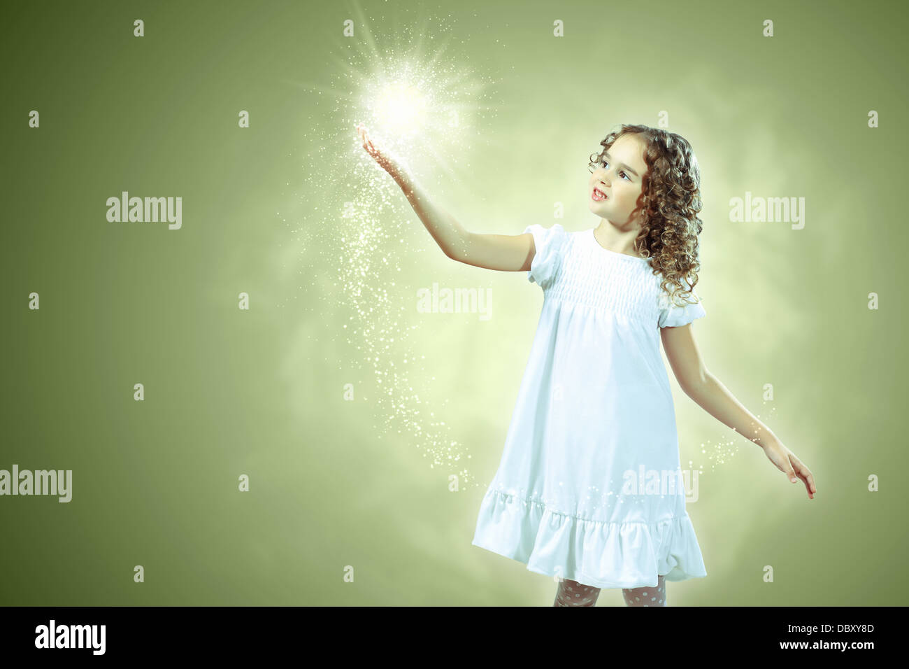 Child with magic light Stock Photo - Alamy