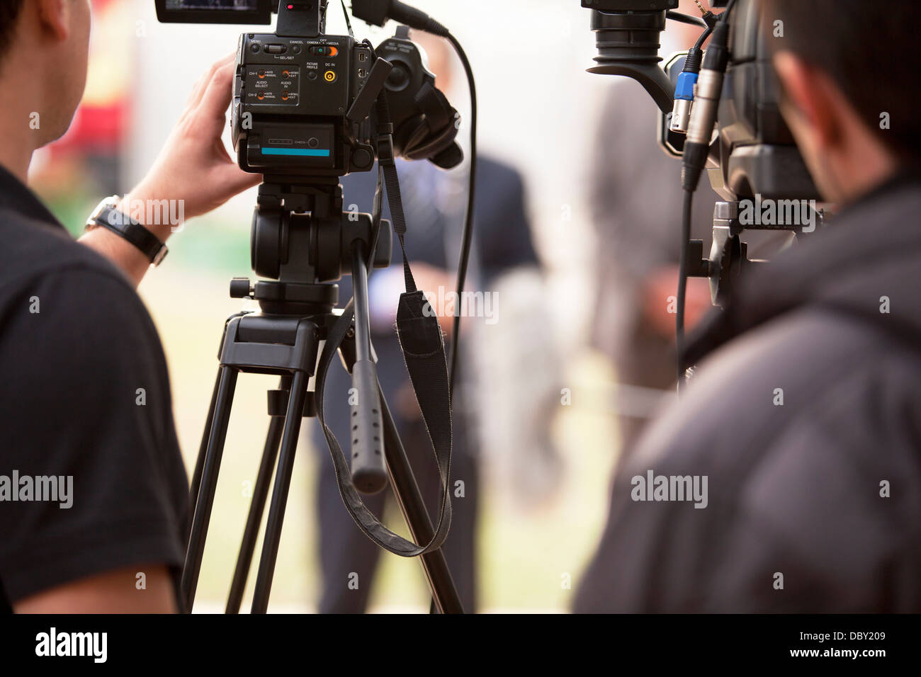 Camerman video camera people hand hi-res stock photography and images ...