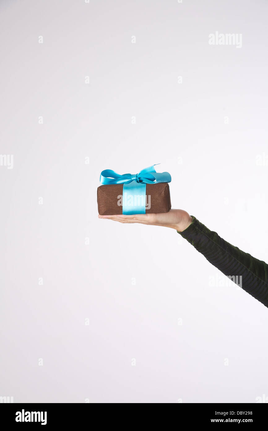 isolated brown present on woman arm Stock Photo - Alamy