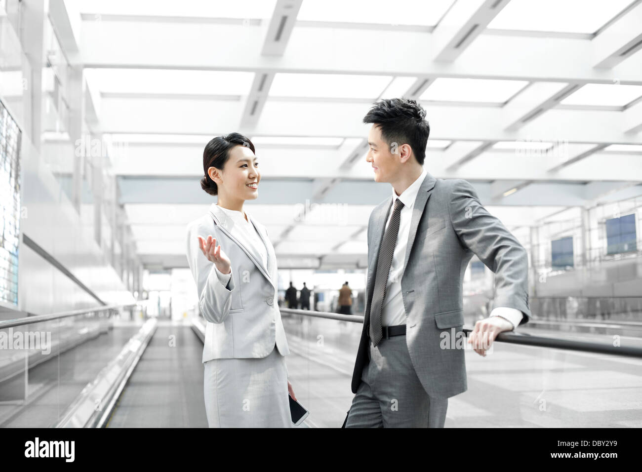 Cheerful two business people talking hi-res stock photography and ...