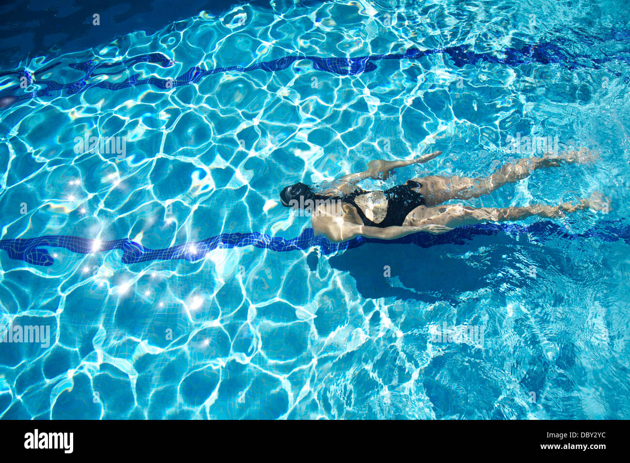 woman diving in a pool Stock Photo - Alamy