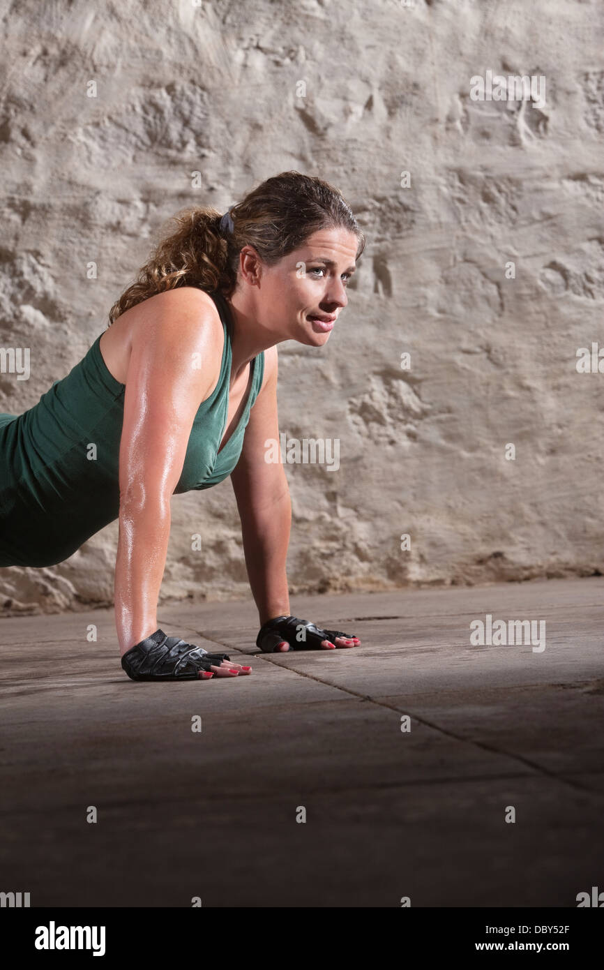 Young Lady Doing Push-ups Stock Photo - Alamy