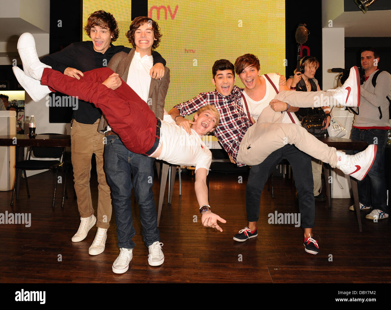 One Direction Boyband meet fans and sign copies of their new single ...