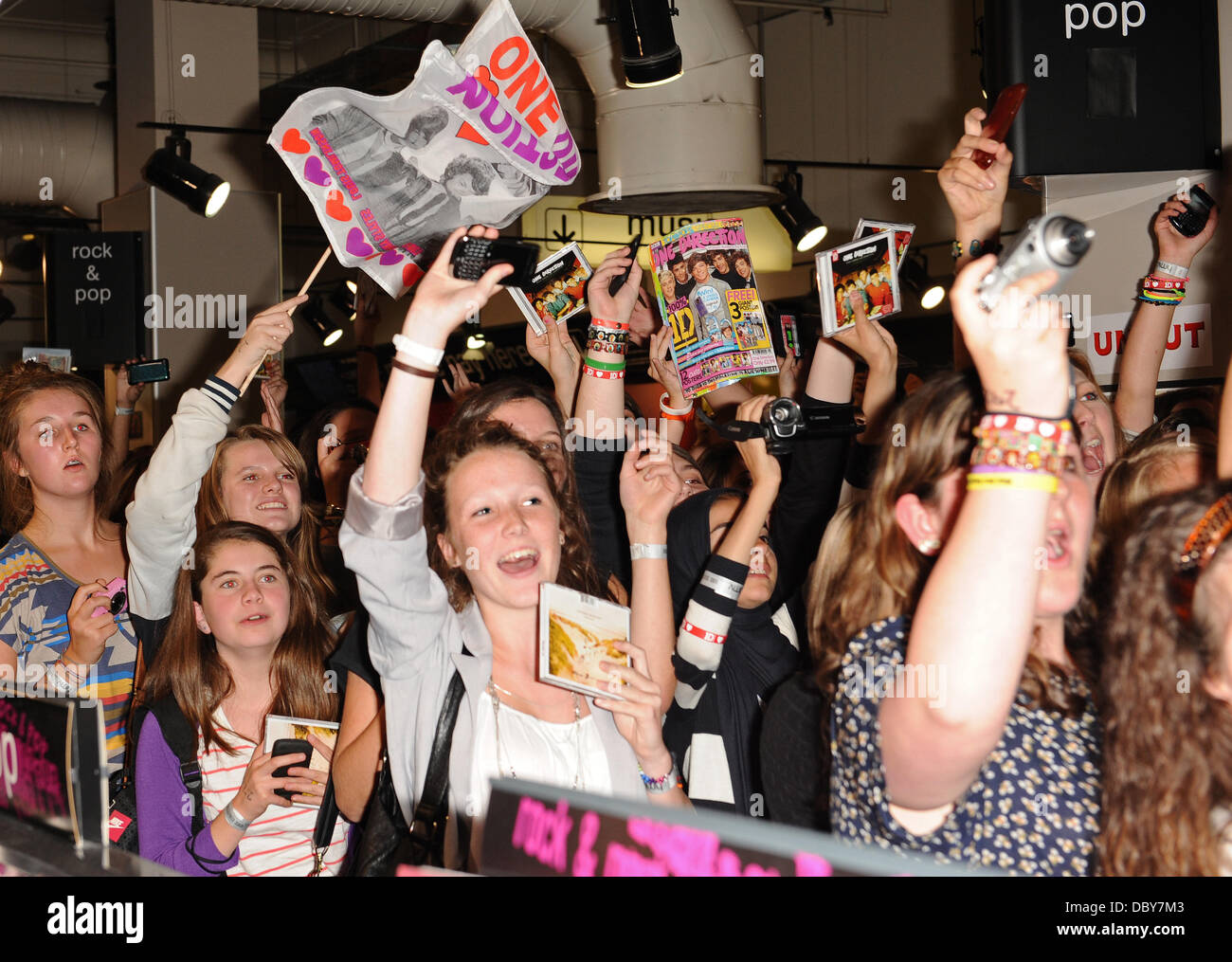 One Direction Boyband meet fans and sign copies of their new single ...