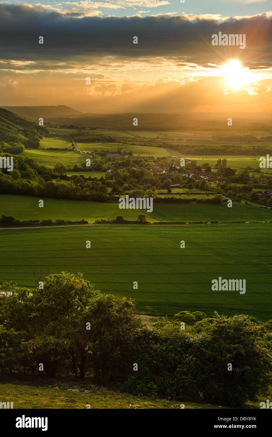 Dramatic sky over english village hi-res stock photography and images ...