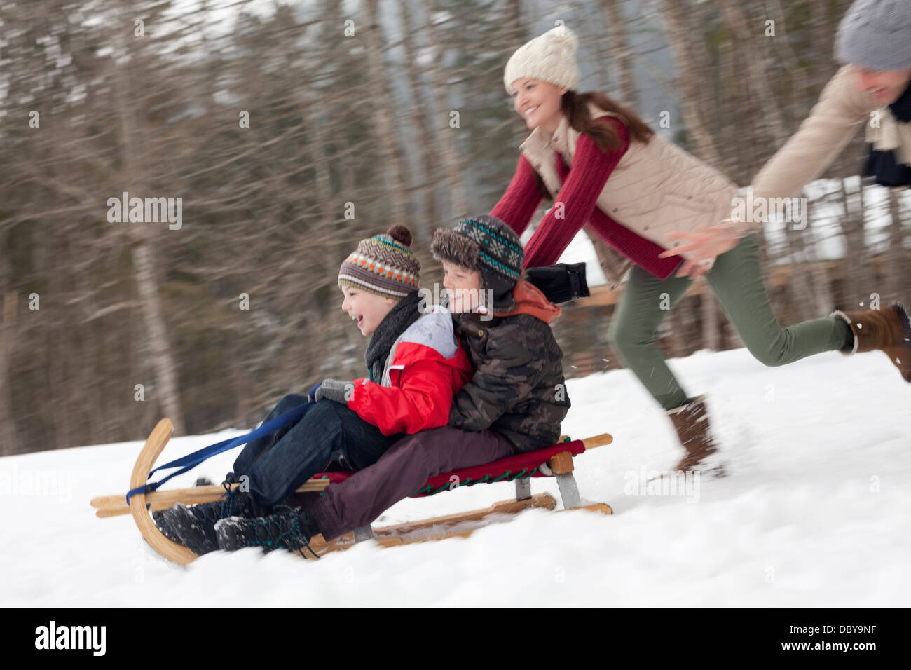 10 11 playing with sled hi-res stock photography and images - Alamy