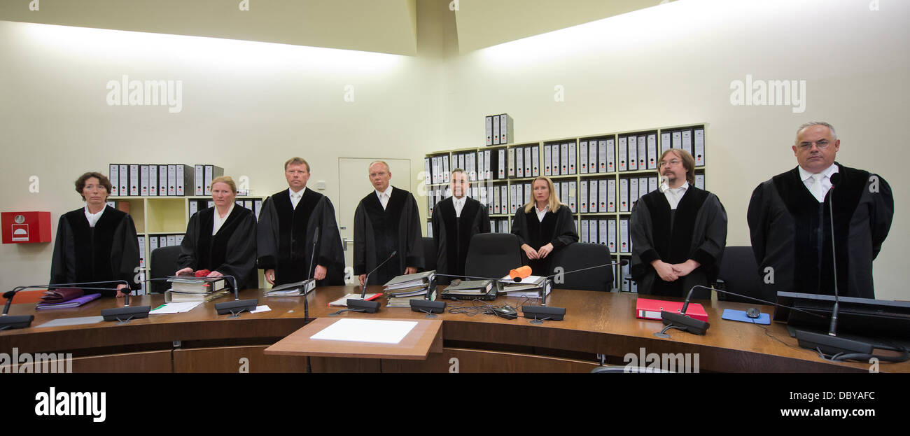 Munich, Germany. 06th Aug, 2013. Presiding judge Manfred Goetzl (4-L ...