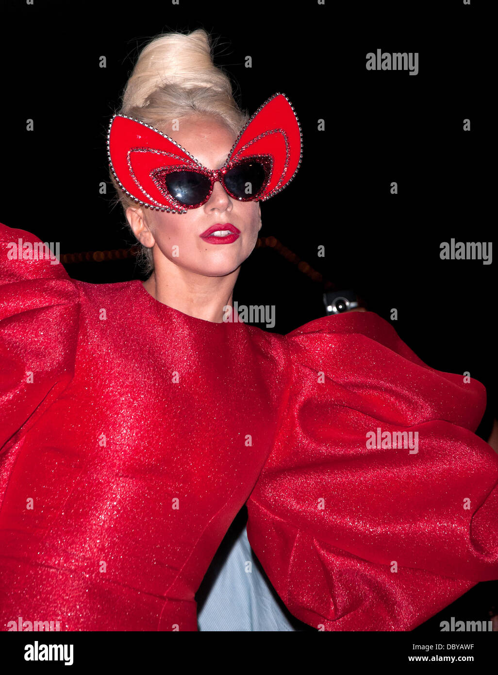 Lady Gaga appears on the set of photo shoot wearing an outlandish ...