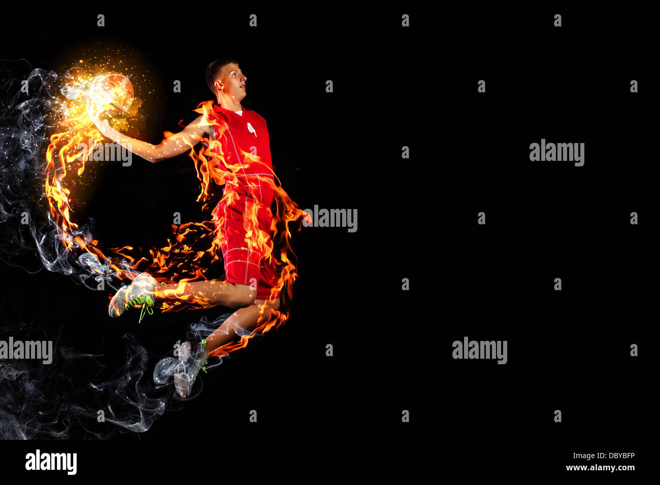 Basketball player with a ball Stock Photo - Alamy