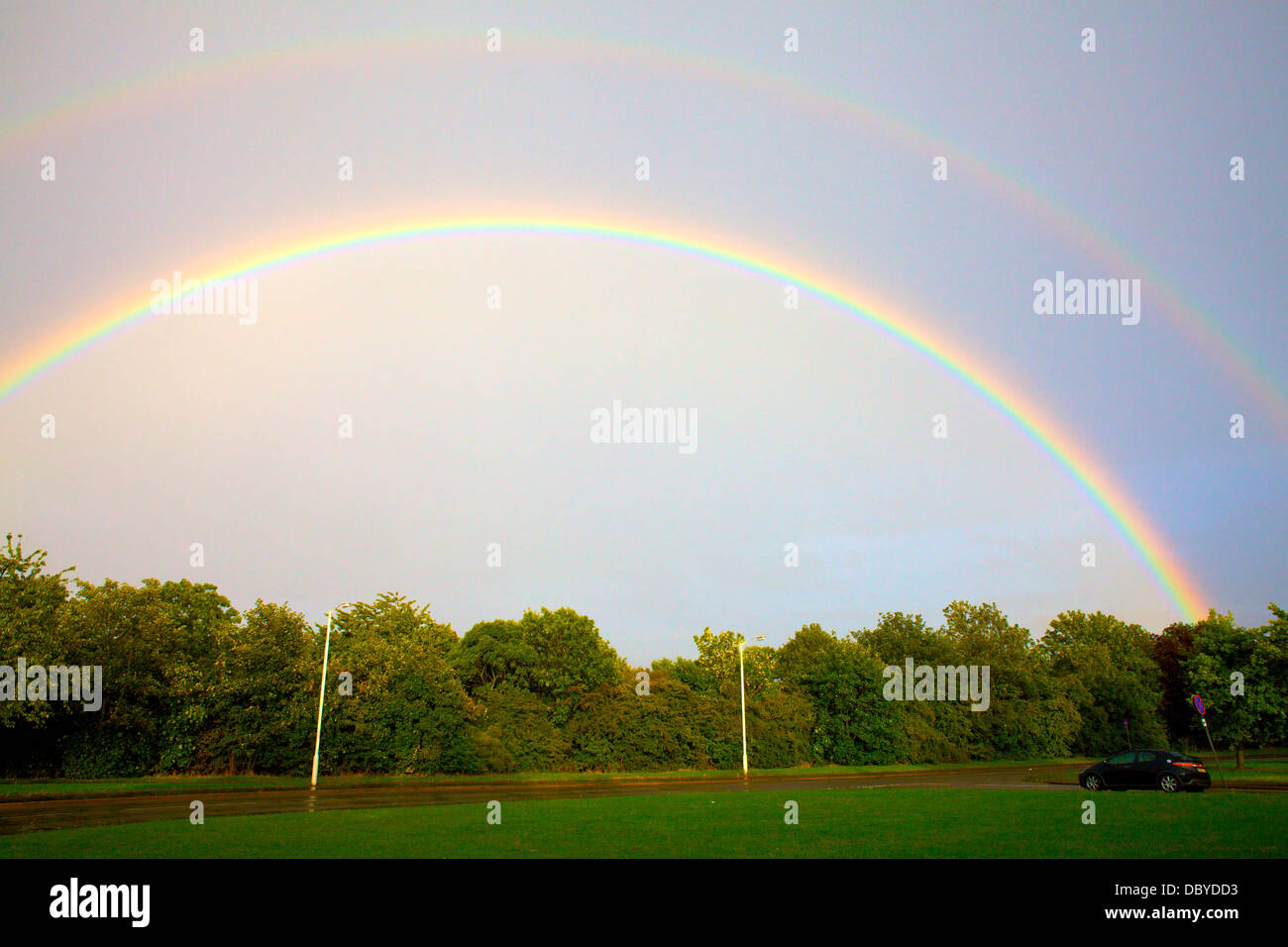 Rainbow in a clear sky over the English countryside Stock Photo - Alamy