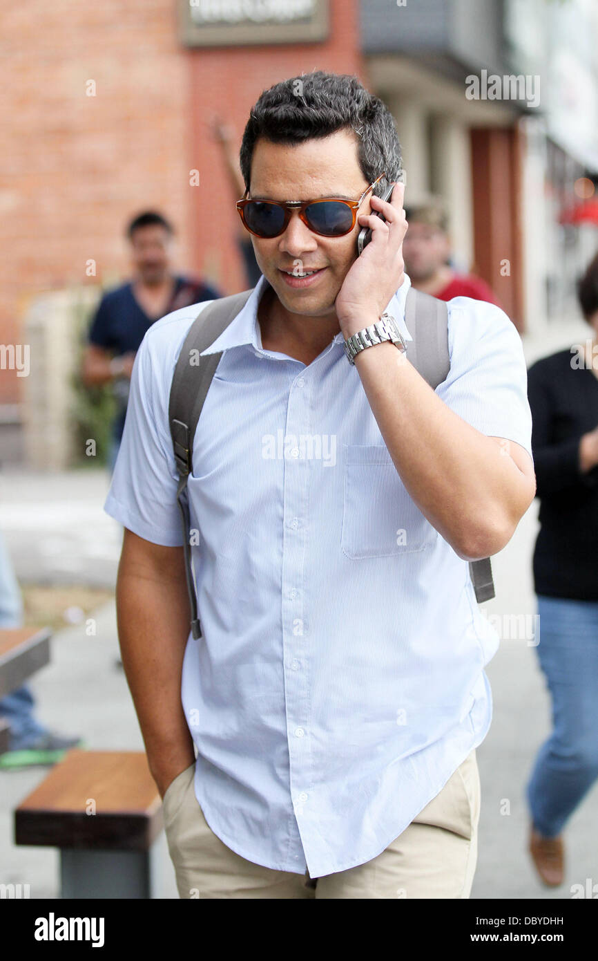 New father, Cash Warren steps out of a business meeting in Beverly ...