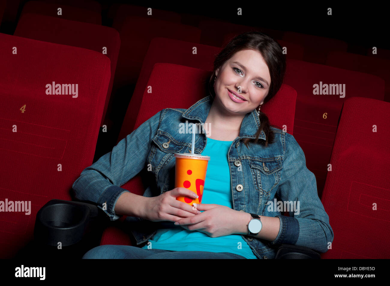 woman in cinema Stock Photo - Alamy