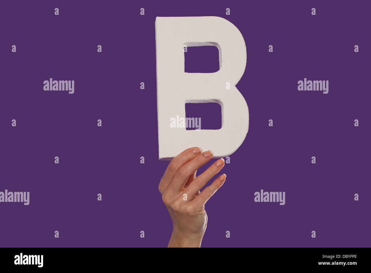 Hand holding letter from alphabet hi-res stock photography and images ...