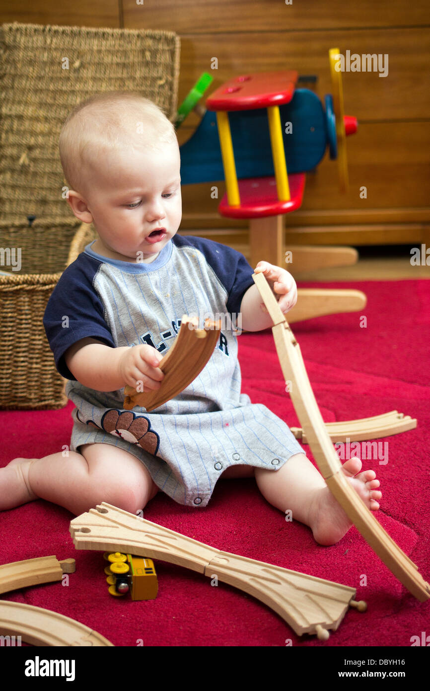 baby with track,train set,all star,playing with model trains,brio, baby ...