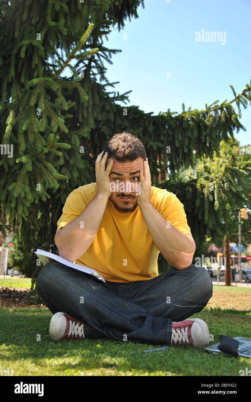 Hispanic male college student lying hi-res stock photography and images ...