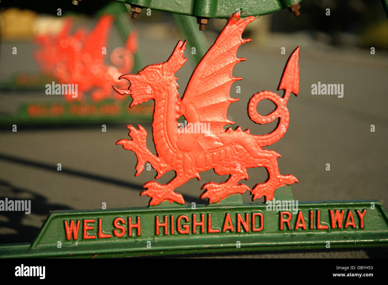 Welsh dragon in cast iron bench at Beddgelert railway station ...