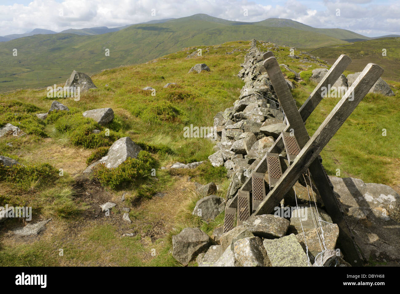 Ladder stile over dry stone wall at the summit of Tal-y-Fan with Foel ...