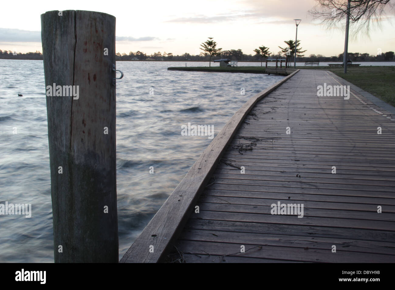 Boardwalk along side of lake Stock Photo - Alamy
