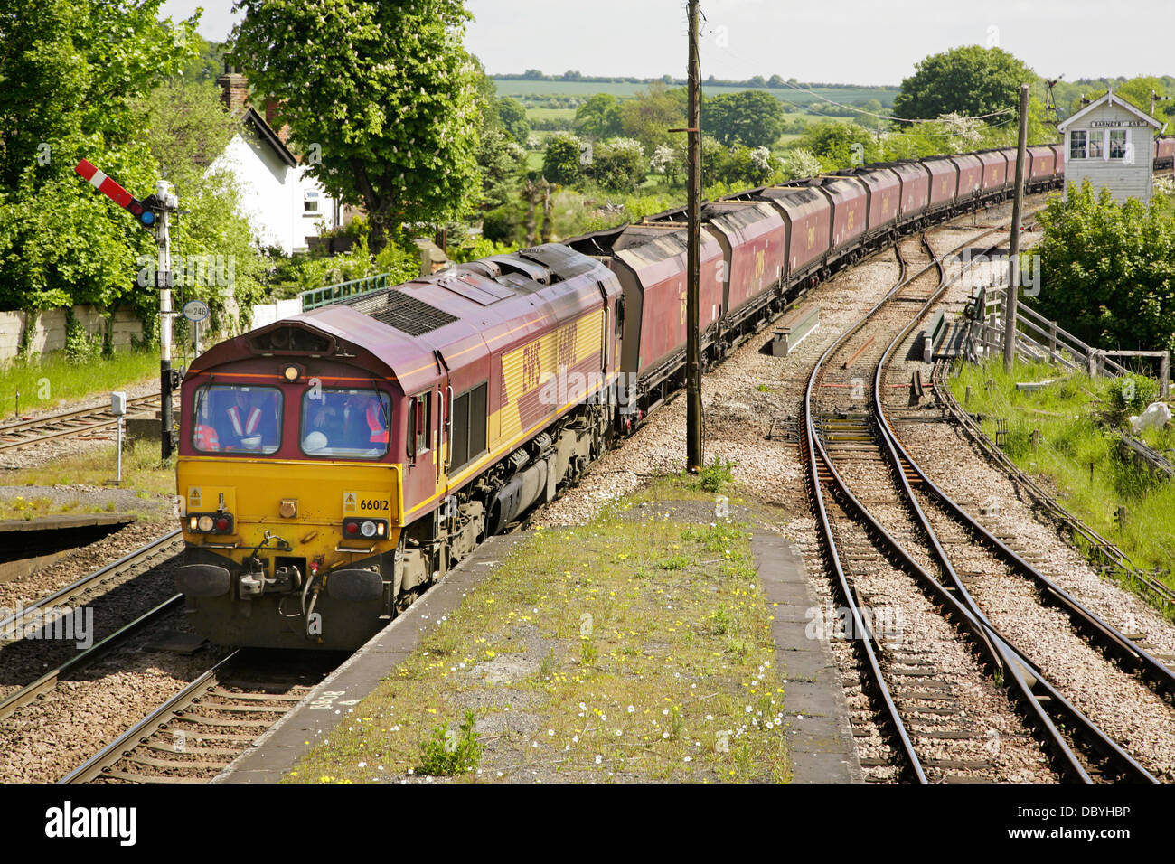 Class 66 diesel locomotive 66012 with train of loaded coal wagons ...