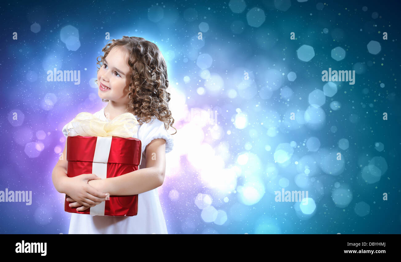 Happy girl opening gift box Stock Photo - Alamy