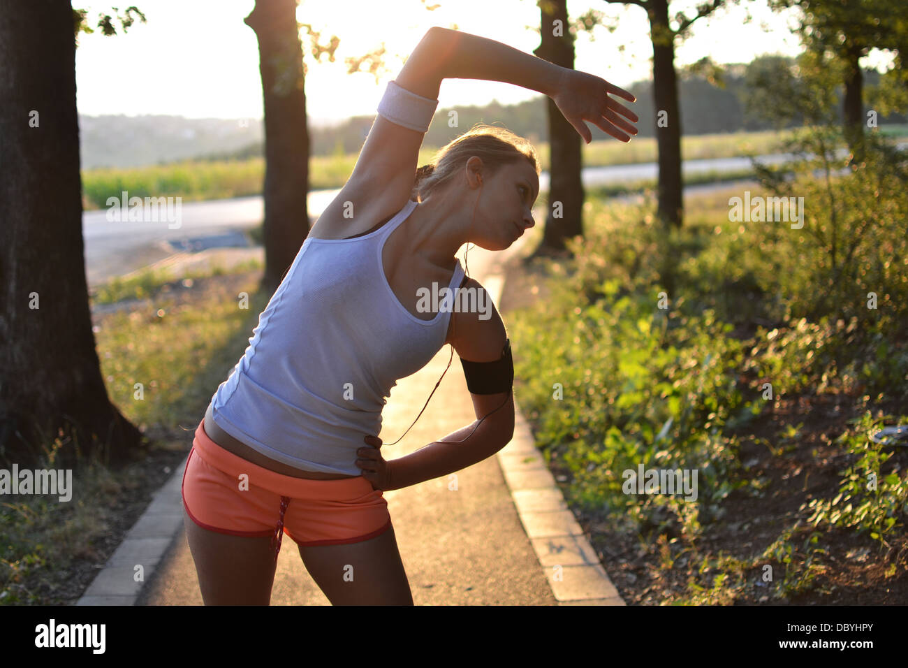 Woman working out in park hi-res stock photography and images - Alamy