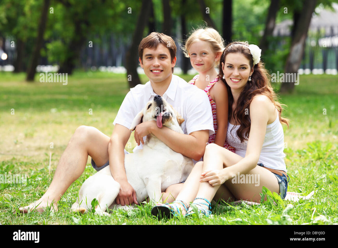 Happy family having fun outdoors Stock Photo - Alamy