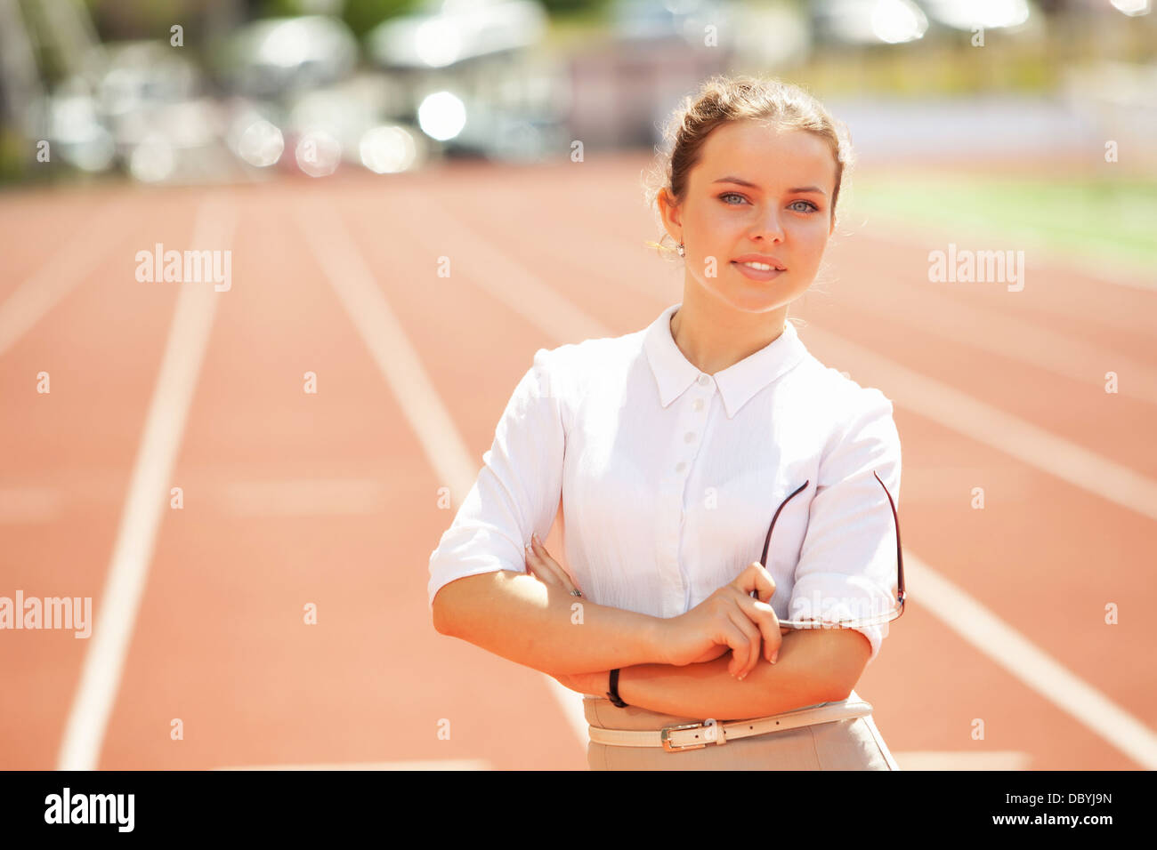 Business woman sport manager at athletic stadium Stock Photo - Alamy