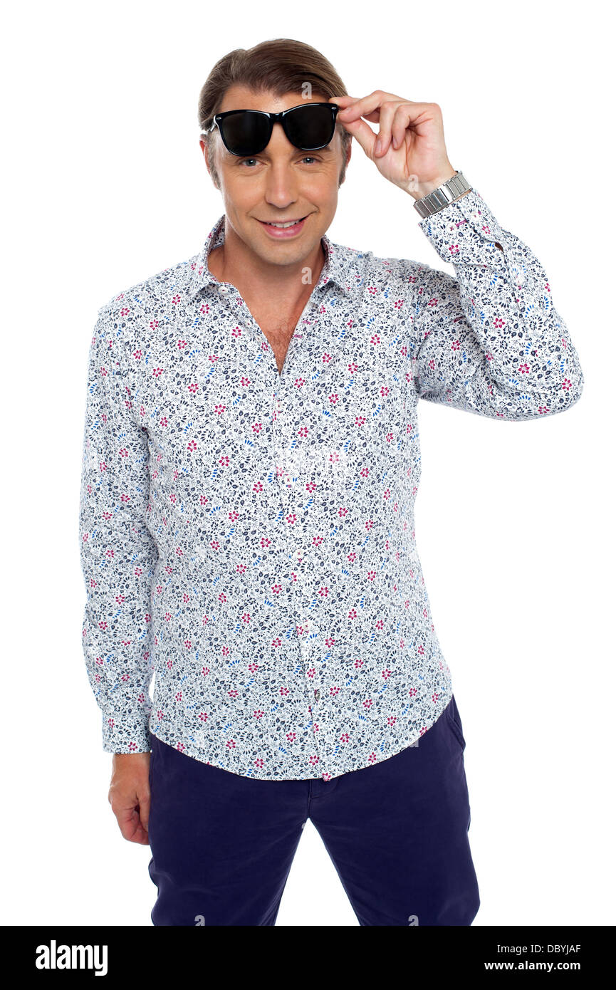 Confident casual man taking off his dark shades Stock Photo - Alamy