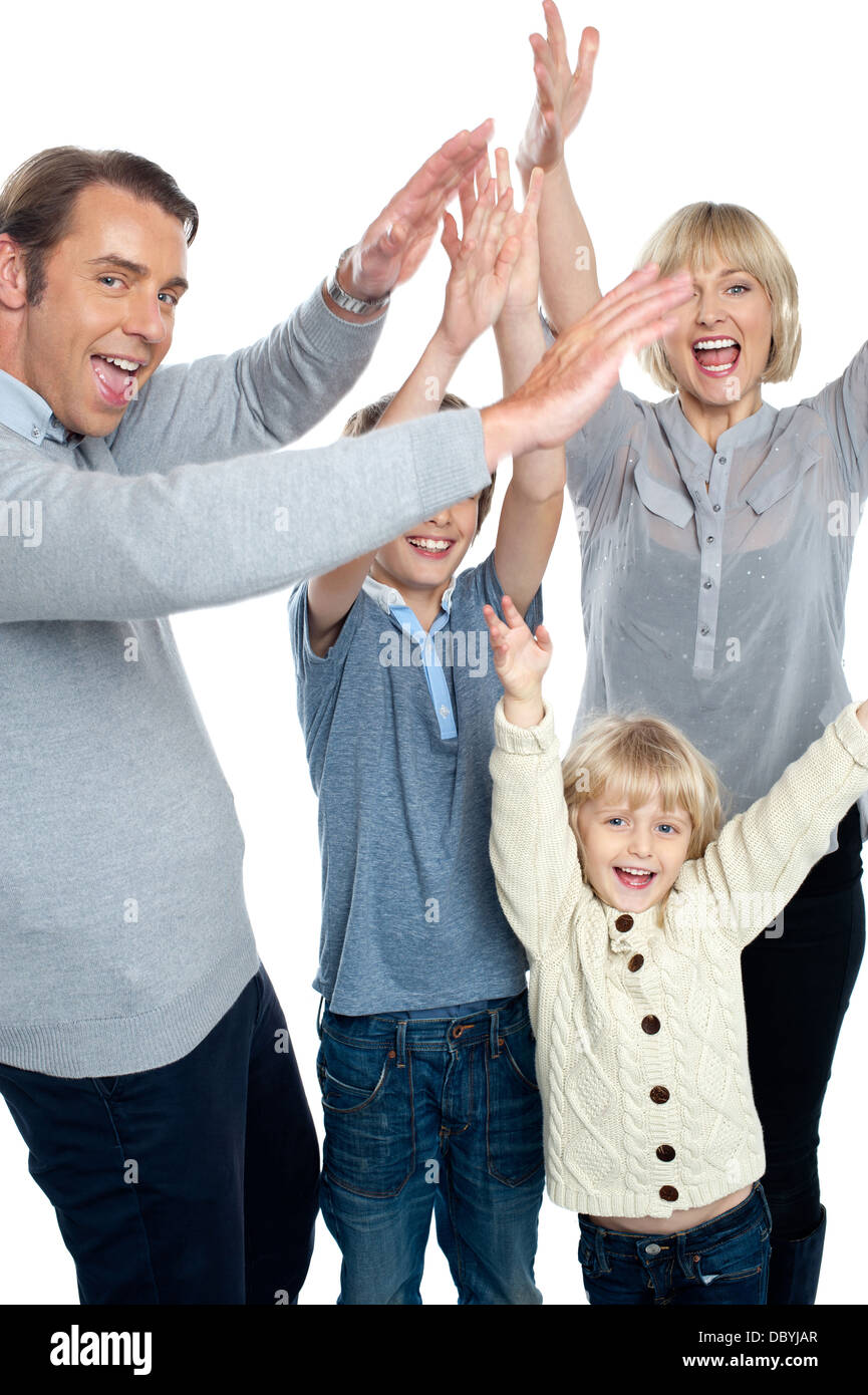 Jubilant family celebrating and partying indoors Stock Photo - Alamy