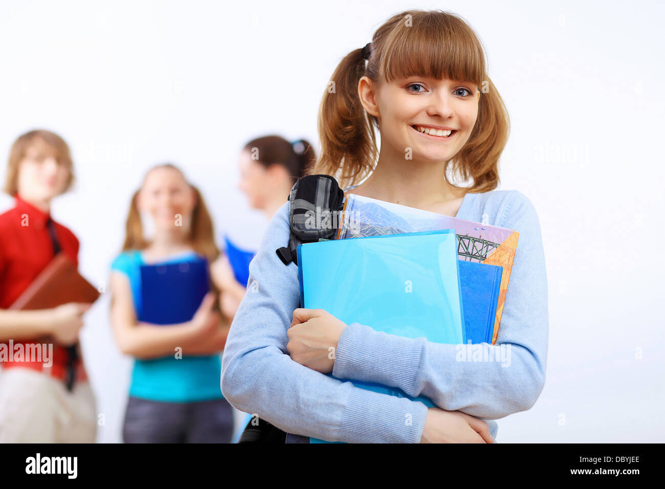 Student with books Stock Photo - Alamy