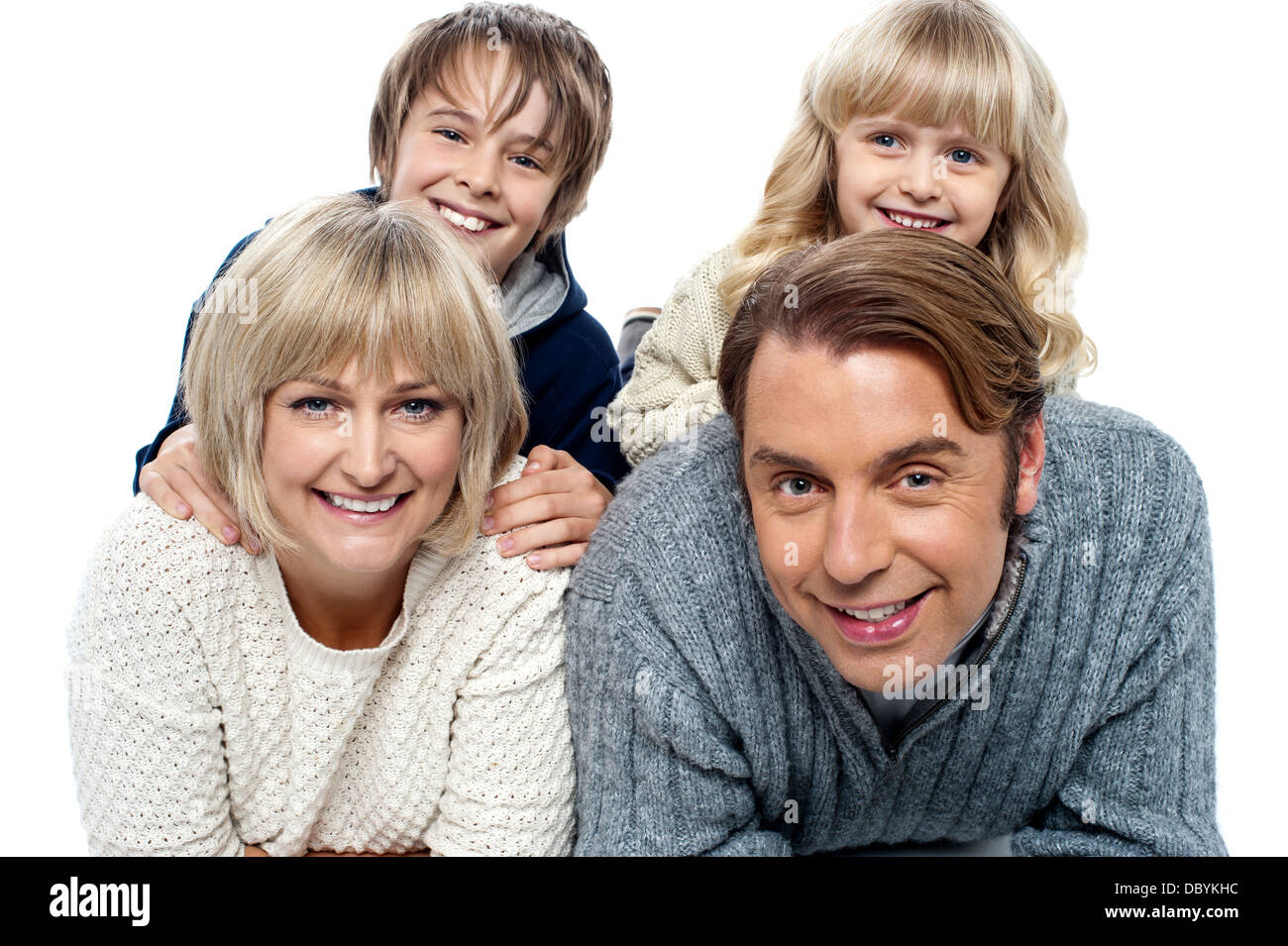 Spirited kids having fun with their parents indoors Stock Photo - Alamy