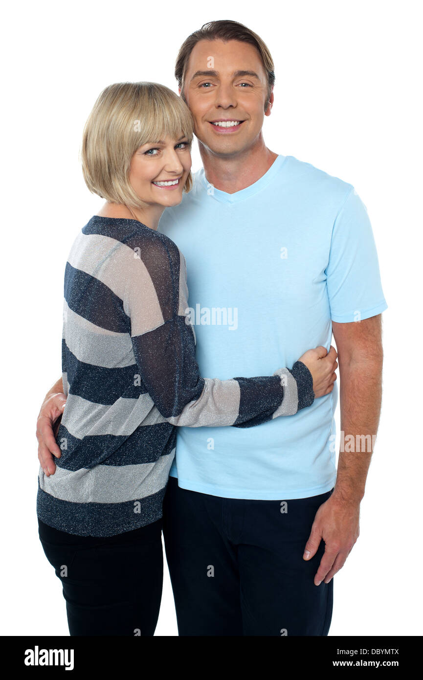Charming middle aged lady embracing her husband Stock Photo - Alamy