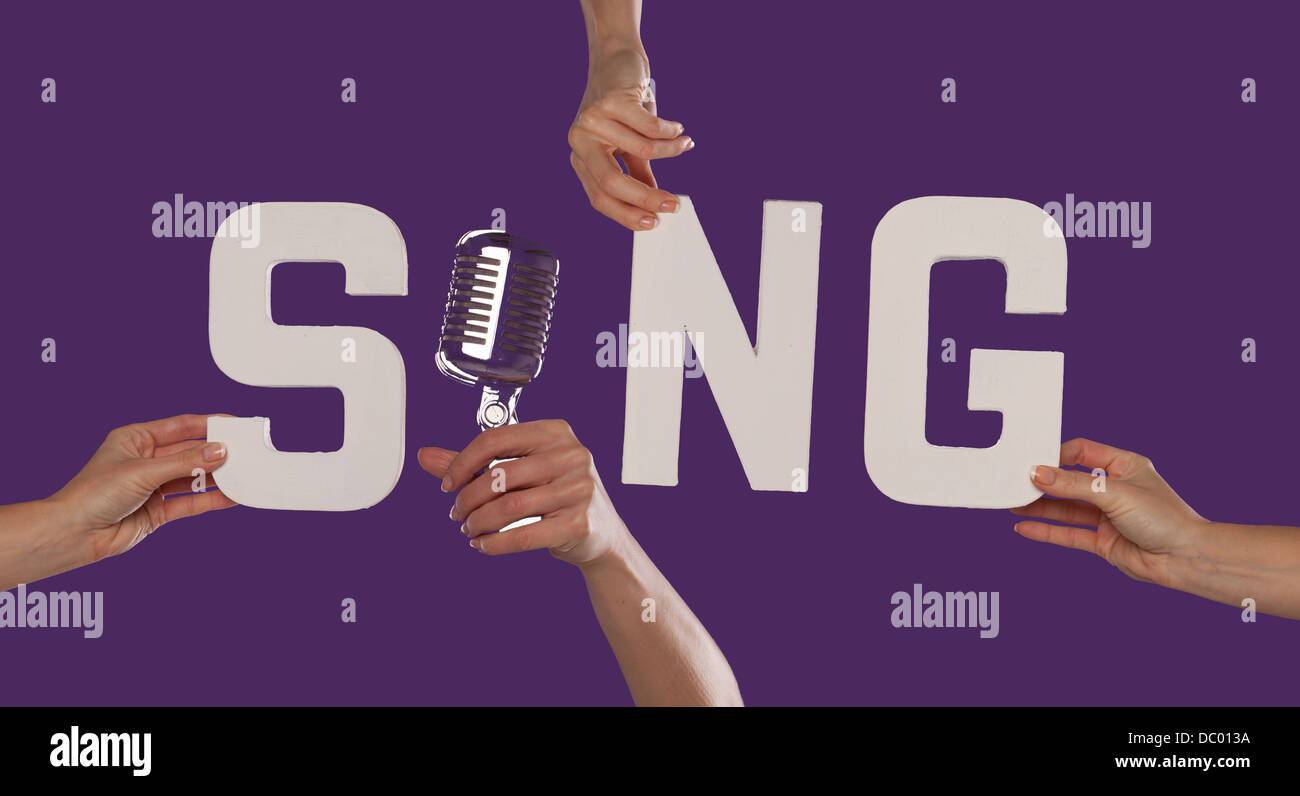 White alphabet lettering spelling SING Stock Photo - Alamy