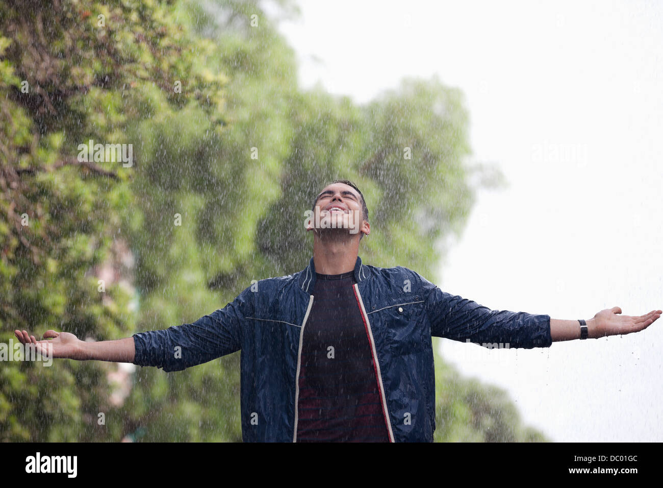 Wet man smile rain one hi-res stock photography and images - Alamy