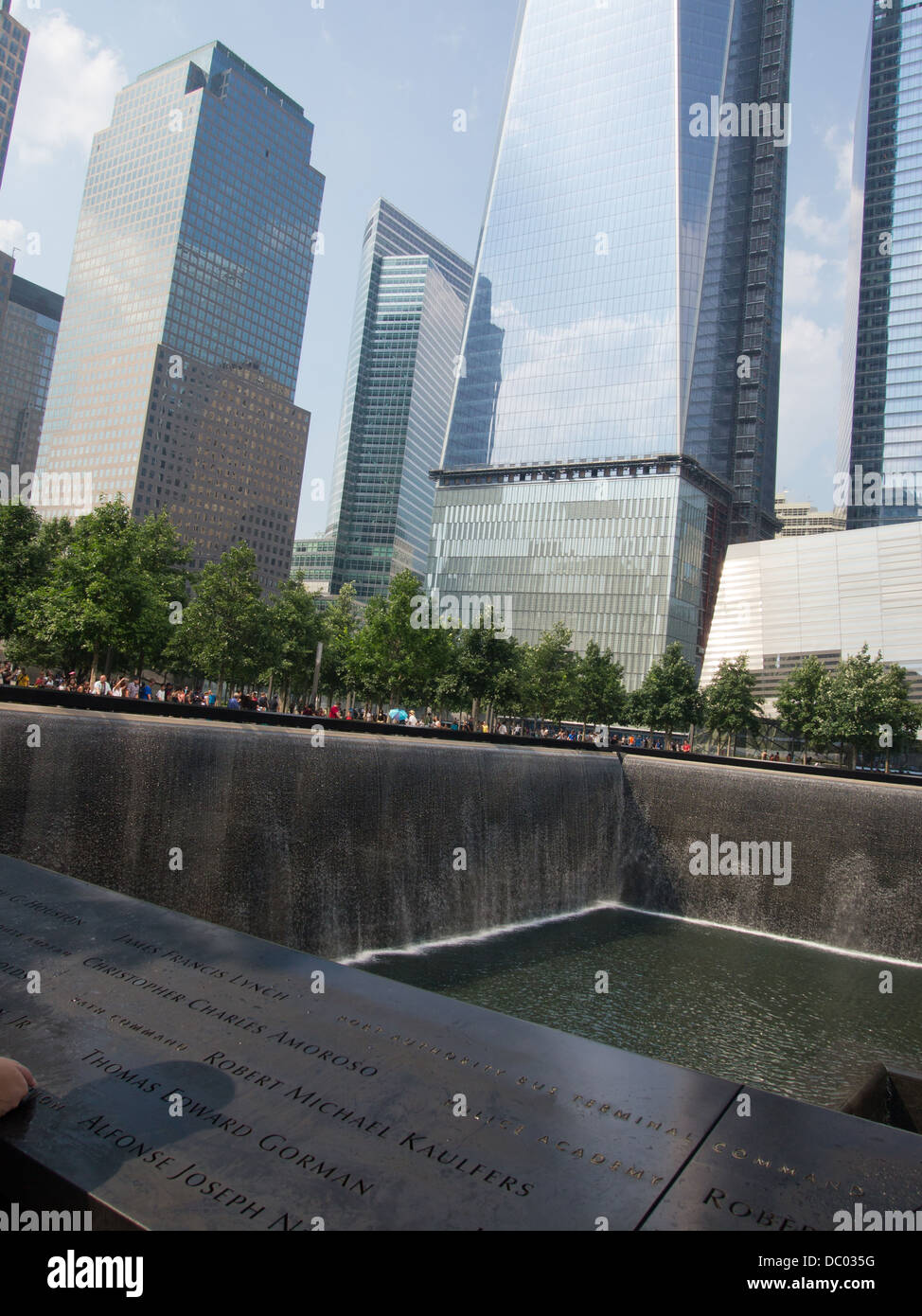 Freedom tower behind reflecting pools in New York City Stock Photo - Alamy