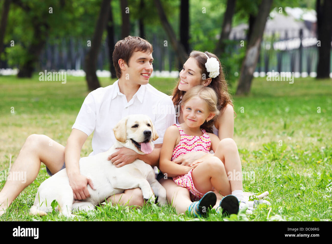 Happy family having fun outdoors Stock Photo - Alamy