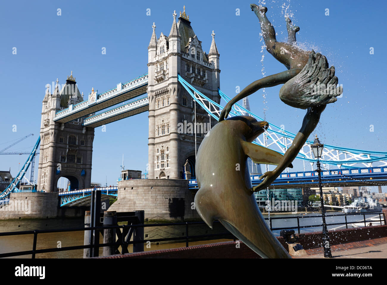 david wynnes girl with a dolphin statue in front of tower bridge London ...