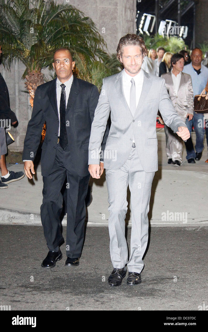 Gerard Butler signs autographs for fans at the 'Machine Gun Preacher ...