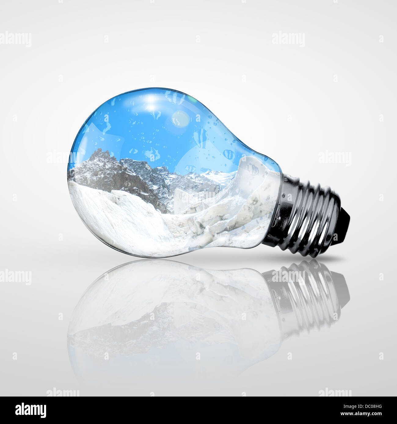 Electric light bulb and mountain inside it Stock Photo - Alamy
