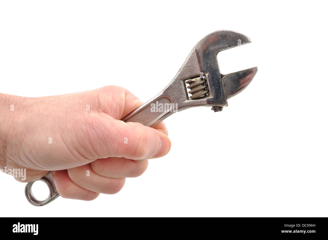 Hand holding an adjustable spanner / wrench Stock Photo - Alamy