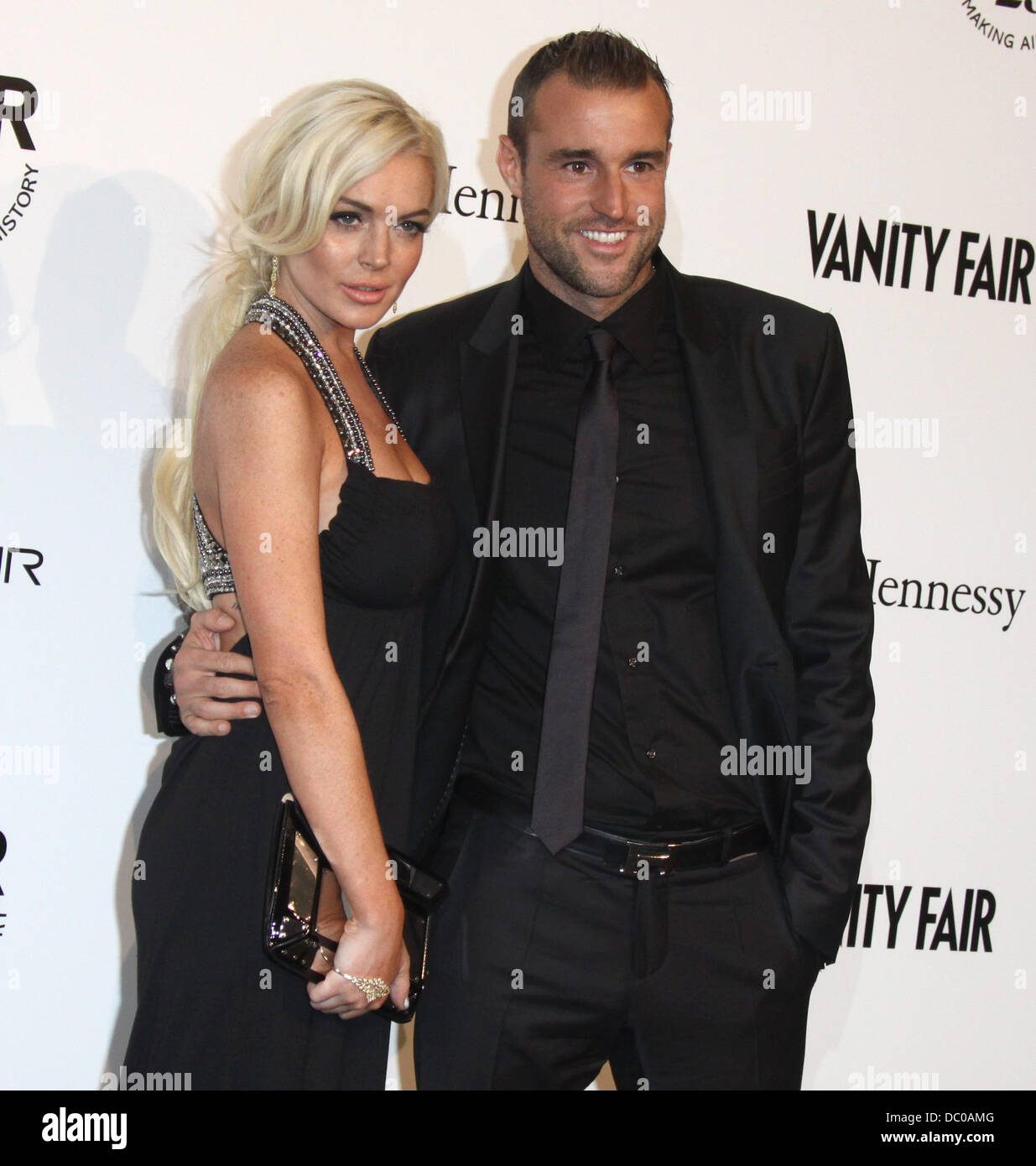 Lindsay Lohan and German designer Philipp Plein 2011 amfAR Milano Gala ...
