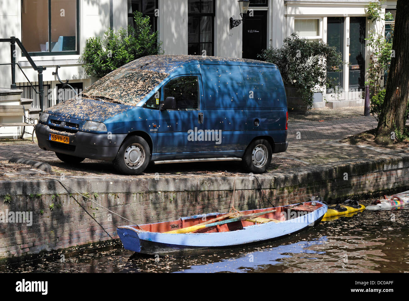 Amsterdam Netherlands Holland Europe small boats along a canal Stock ...