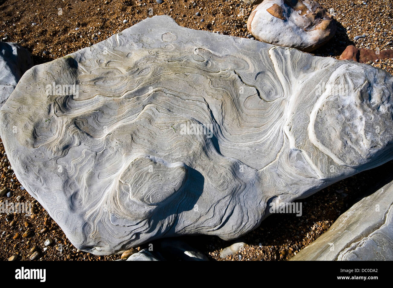 Interestingly eroded sedimentary rocks on the Nudist Beach near ...