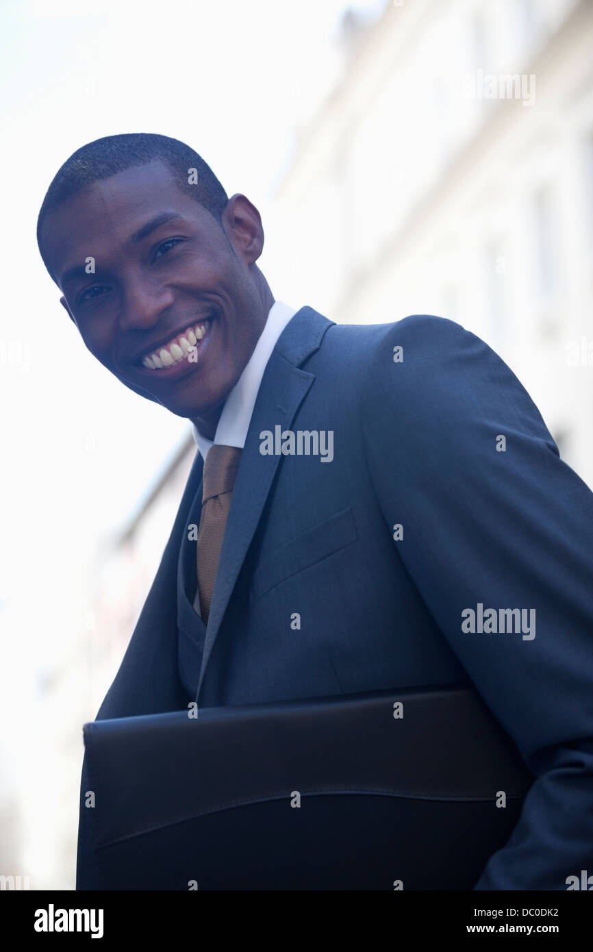 Delighted handsome guy smiling hi-res stock photography and images - Alamy