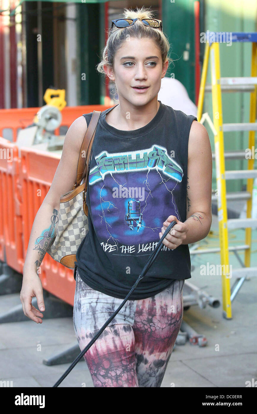 Katie Waissel out and about walking her dogs in Primrose Hill London ...