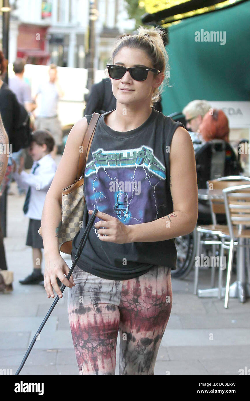 Katie Waissel out and about walking her dogs in Primrose Hill London ...