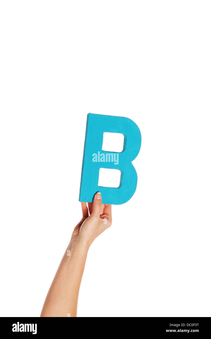 hand holding up the letter B from the bottom Stock Photo - Alamy