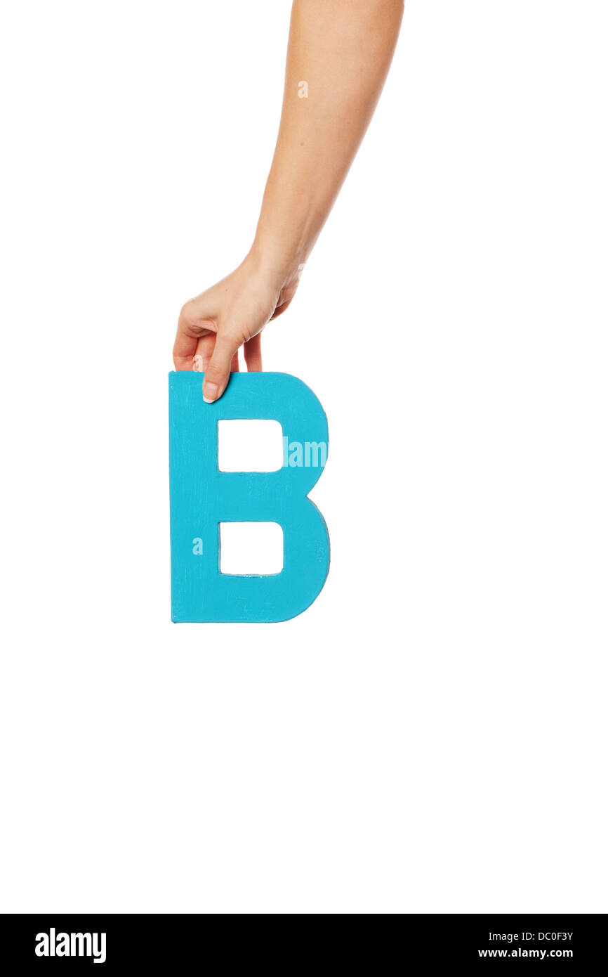 hand holding up the letter B from the top Stock Photo - Alamy