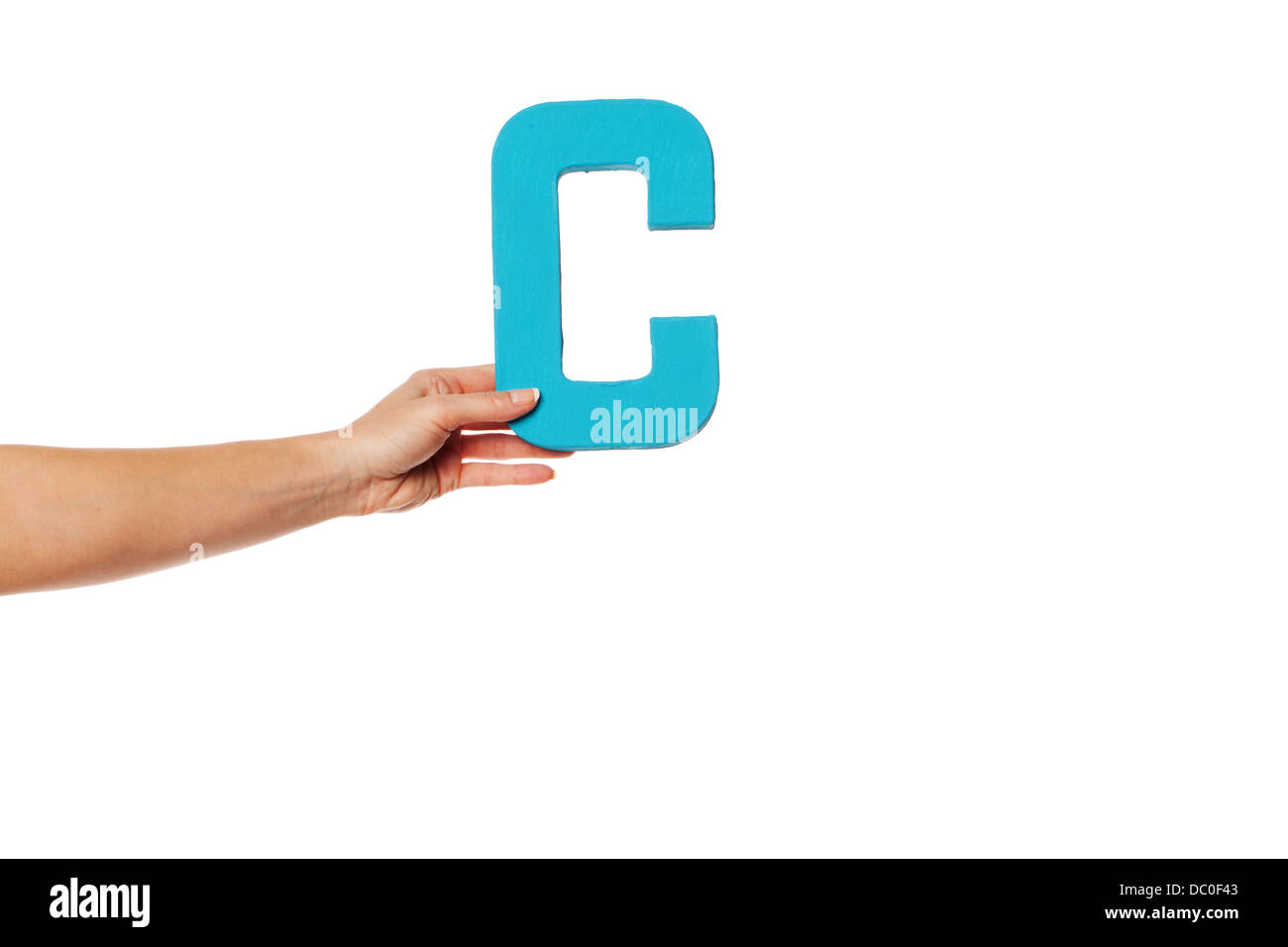 hand holding up the letter C from the left Stock Photo - Alamy