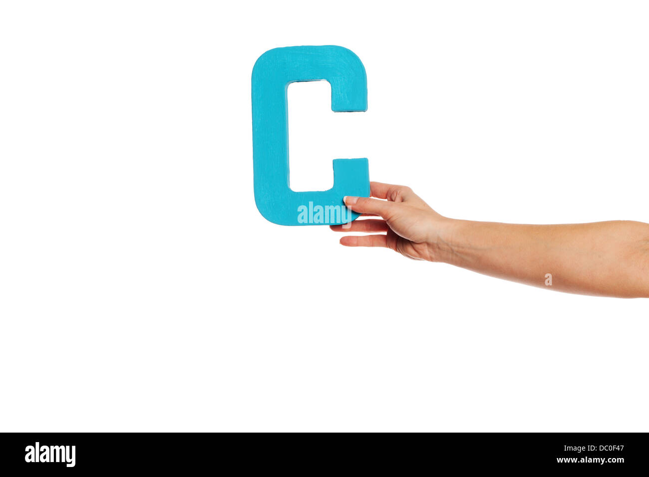 hand holding up the letter C from the right Stock Photo - Alamy